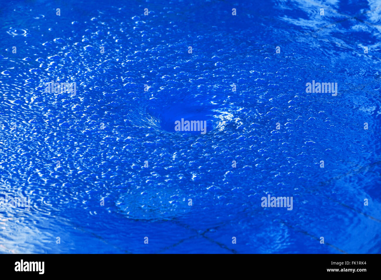 whirlpool with bubbles in new pool Stock Photo - Alamy