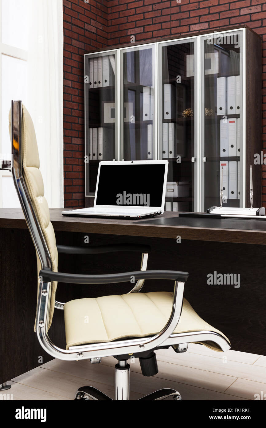 laptop on a desk in a modern office Stock Photo - Alamy