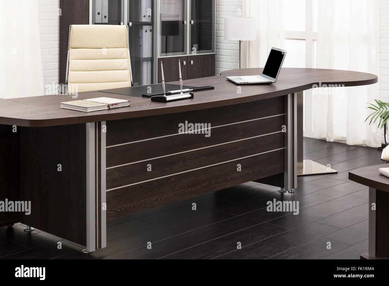 laptop on a desk in a modern office Stock Photo - Alamy