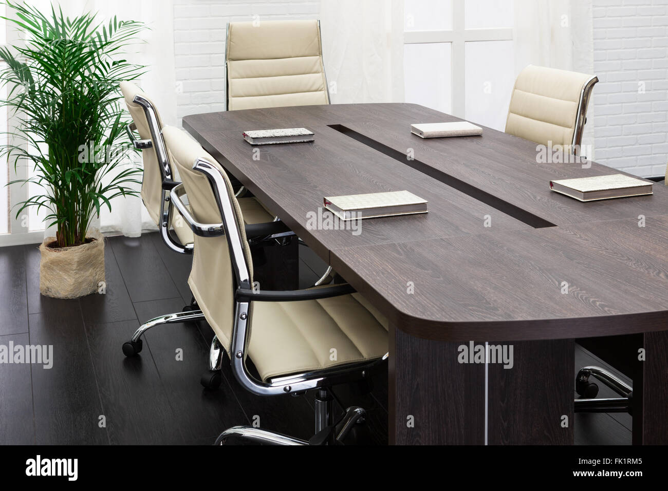 a large table and chairs in a modern conference room Stock Photo - Alamy