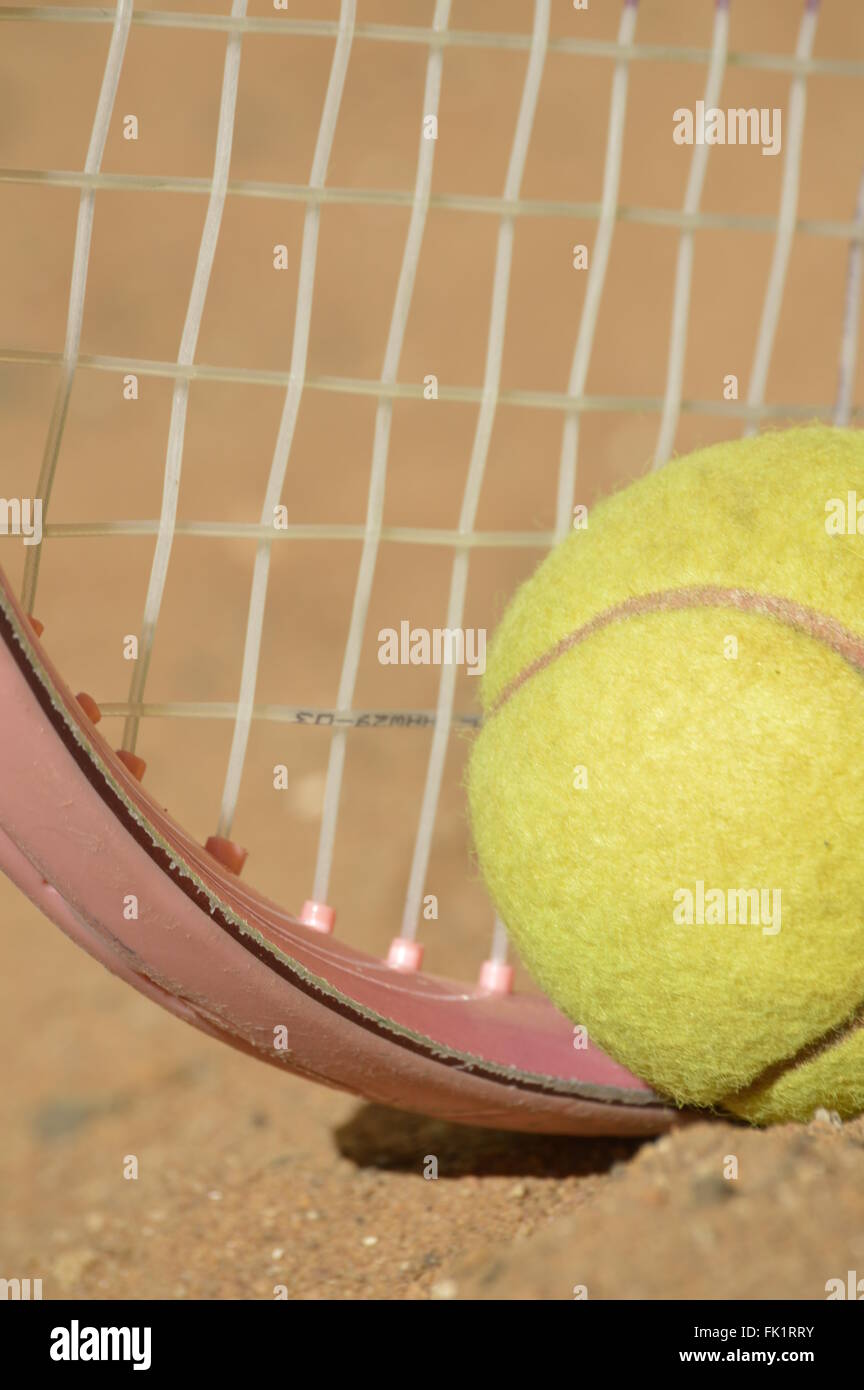 Tennis training desert racket sand sandy ball Stock Photo - Alamy