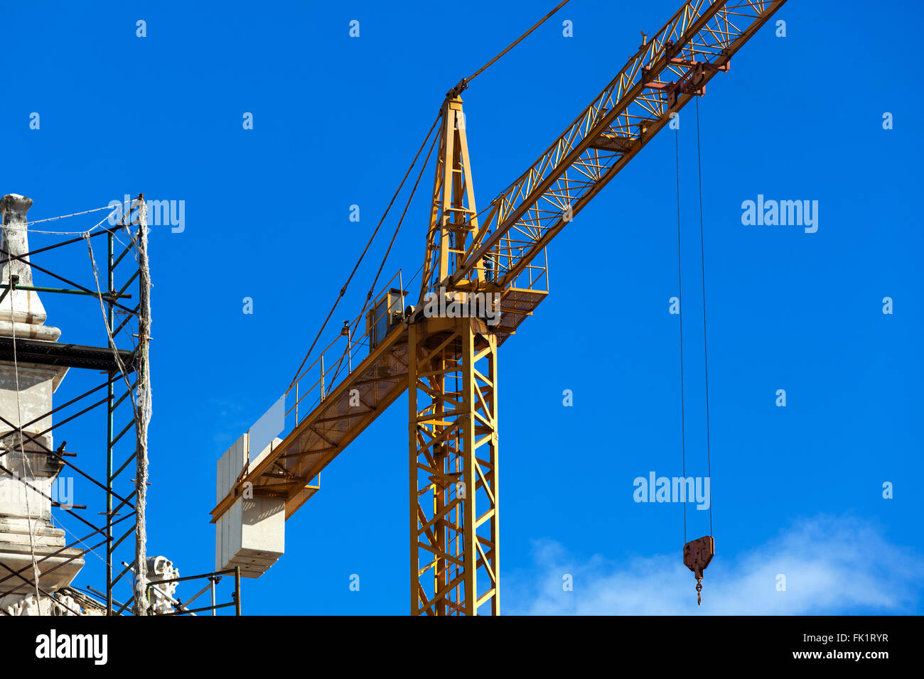 crane on the reconstruction of the old building Stock Photo - Alamy