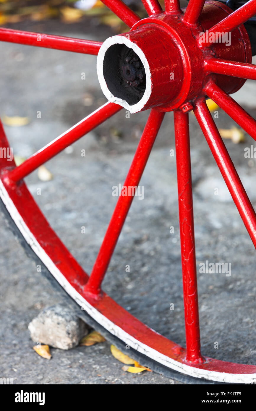red wooden wheel on the road Stock Photo - Alamy