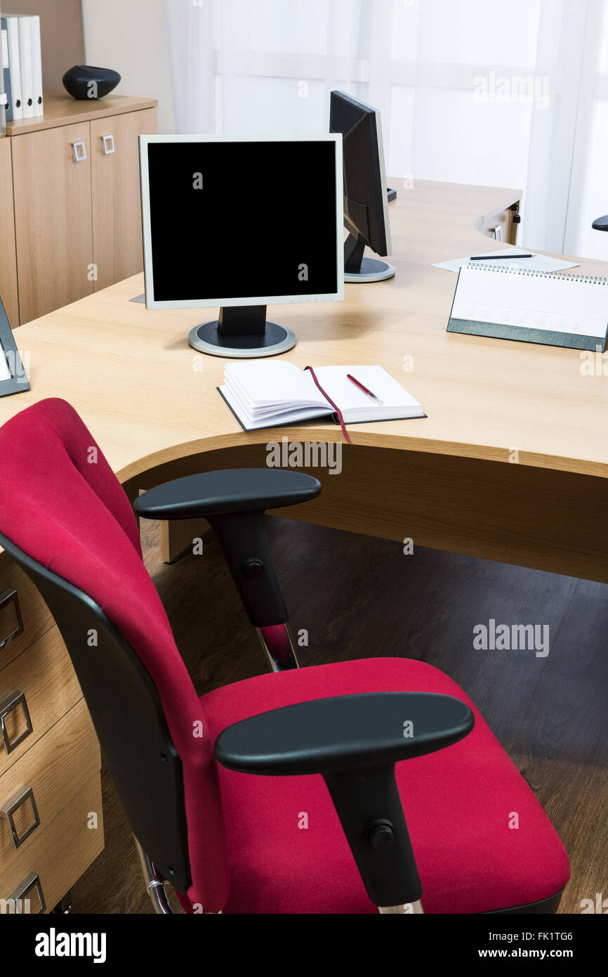 monitors on a desk in a modern office Stock Photo - Alamy