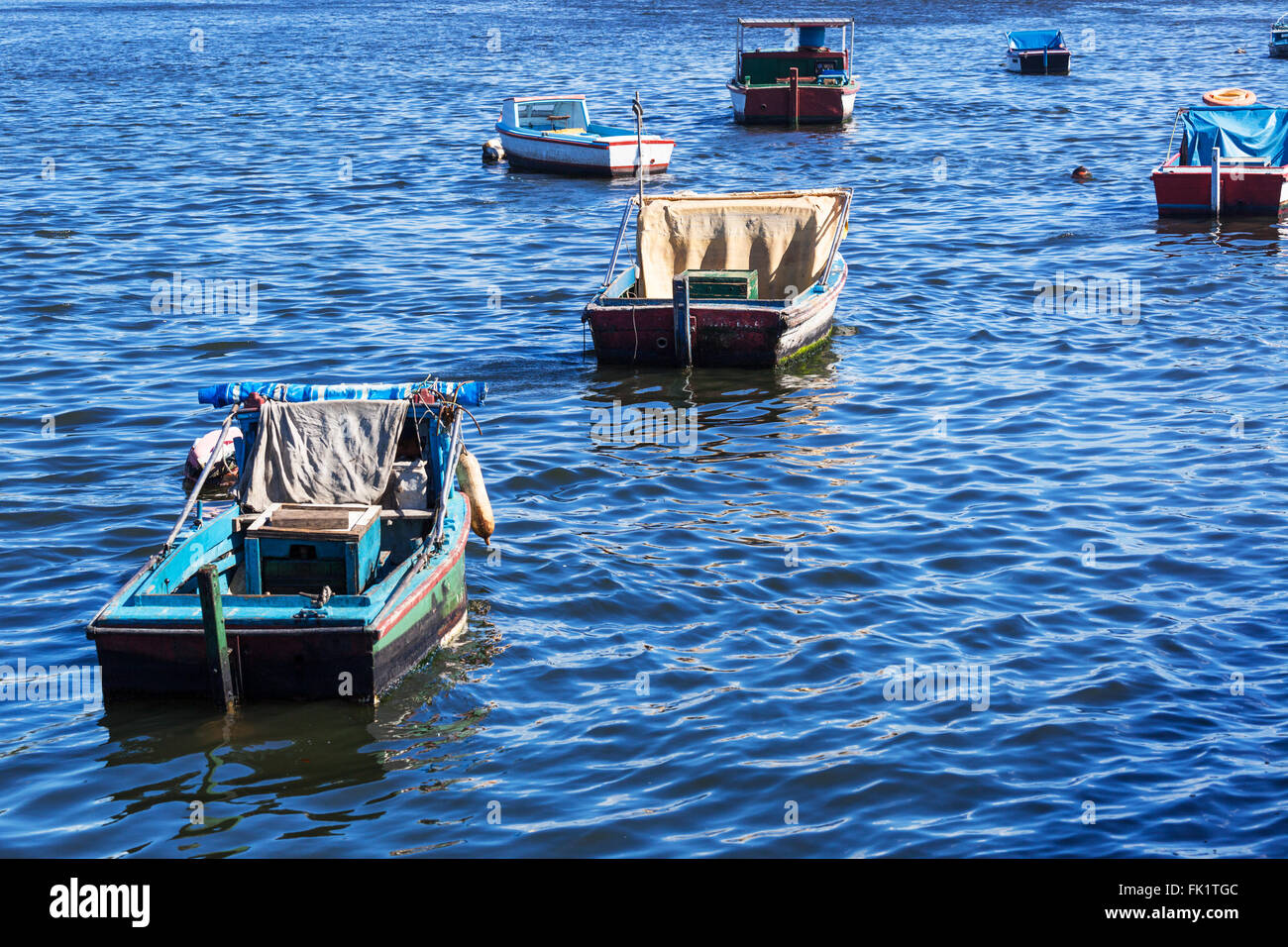 Fishing boats in the bay ocean Stock Photo - Alamy