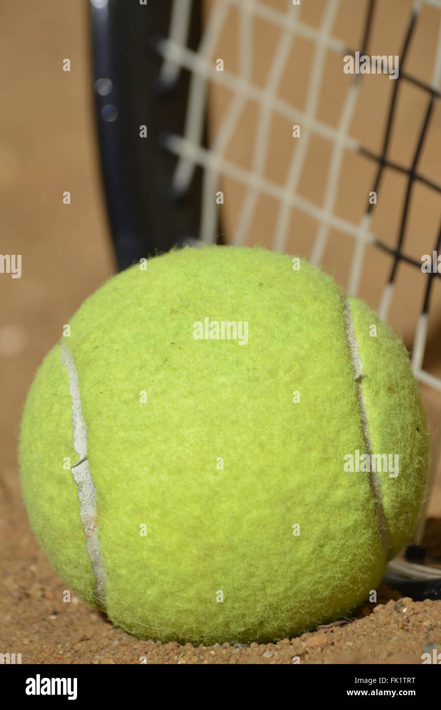 Tennis training desert racket sand sandy ball Stock Photo - Alamy