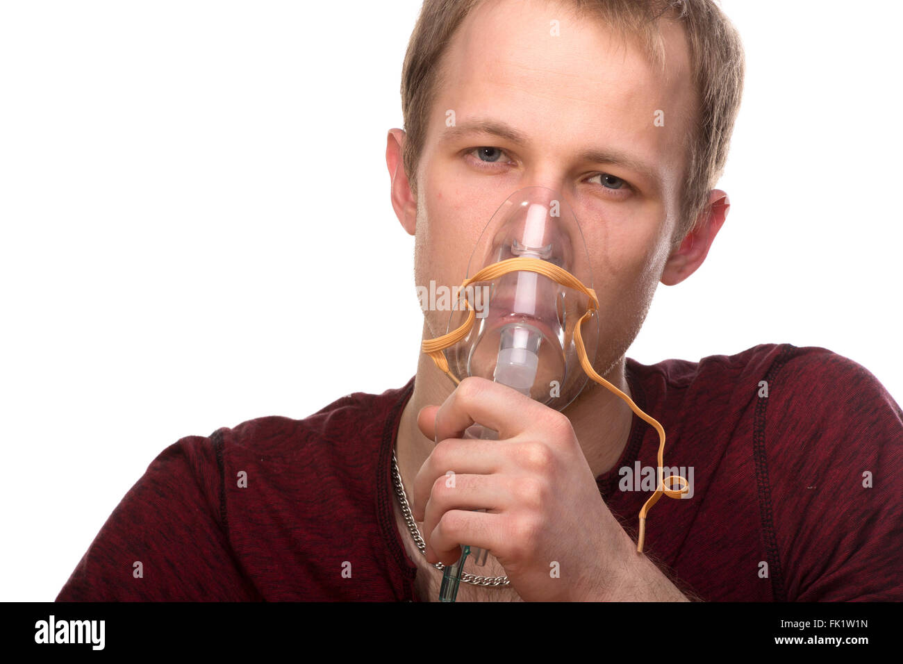 Young man using nebulizer mask for respiratory inhaler Asthma Treatment ...