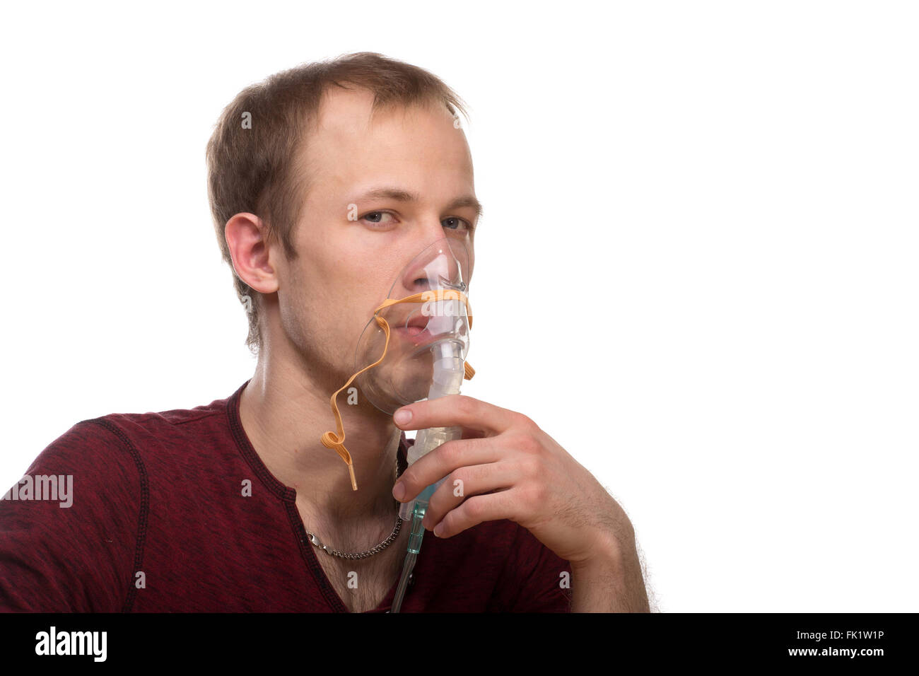 Young man using nebulizer mask for respiratory inhaler Asthma Treatment ...