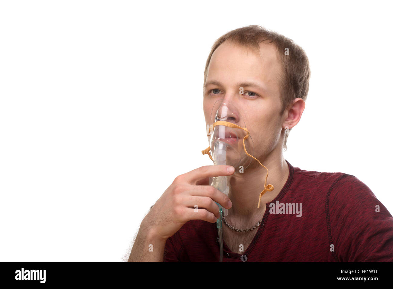 Young man using nebulizer mask for respiratory inhaler Asthma Treatment ...