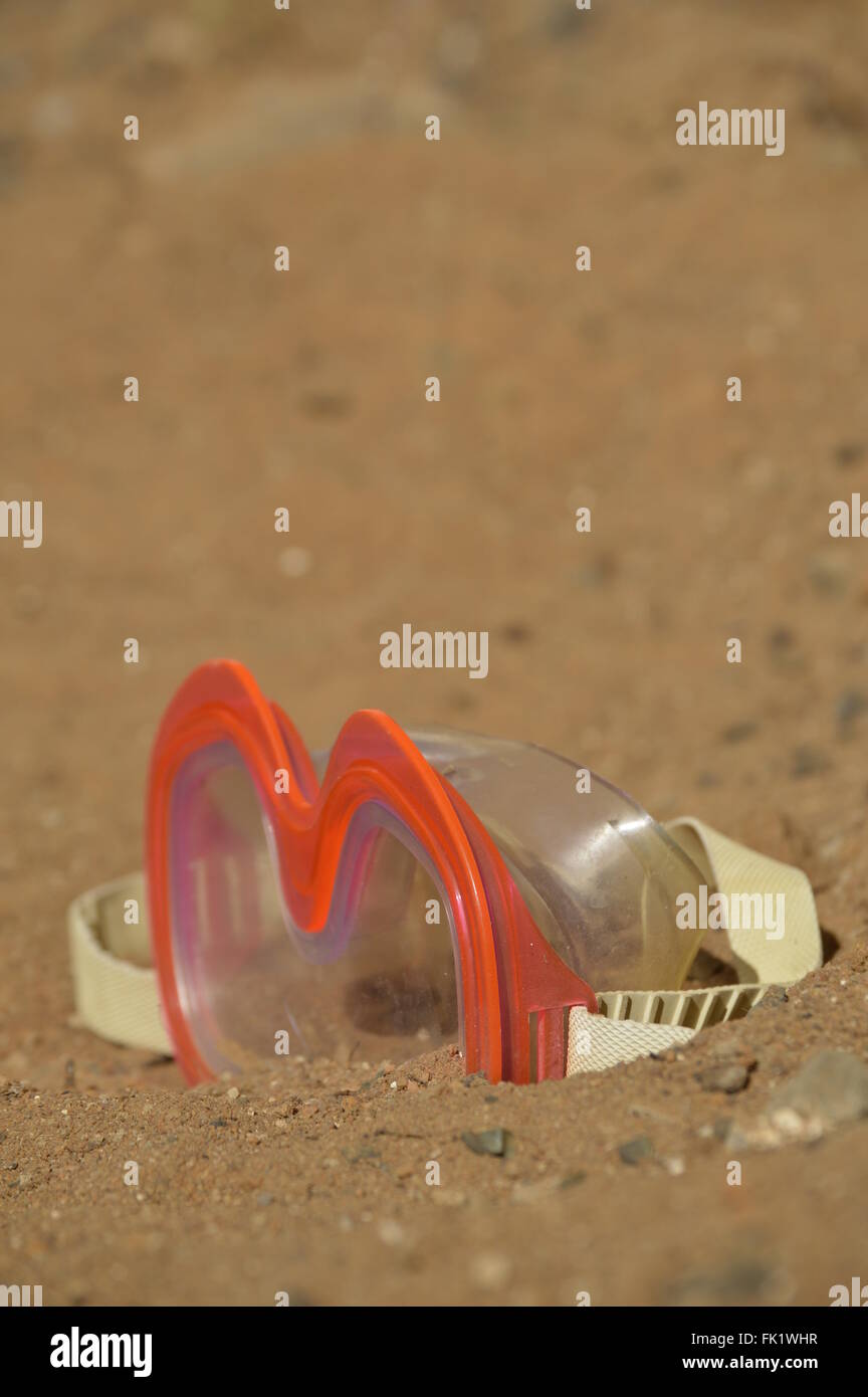 diving mask on desert Stock Photo - Alamy