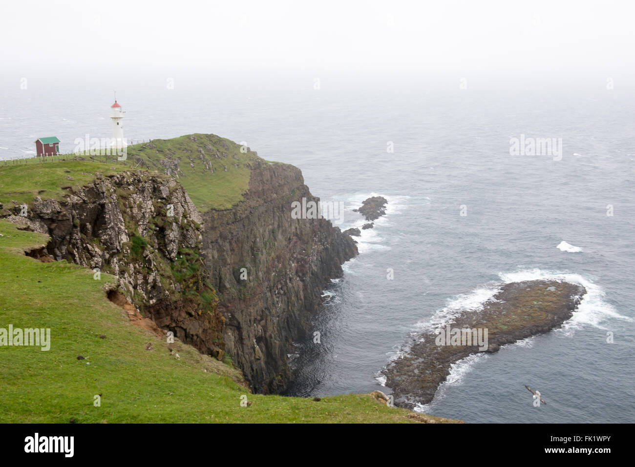 Landscape on the Faroe Islands with lighthouse at Akraberg on the ...