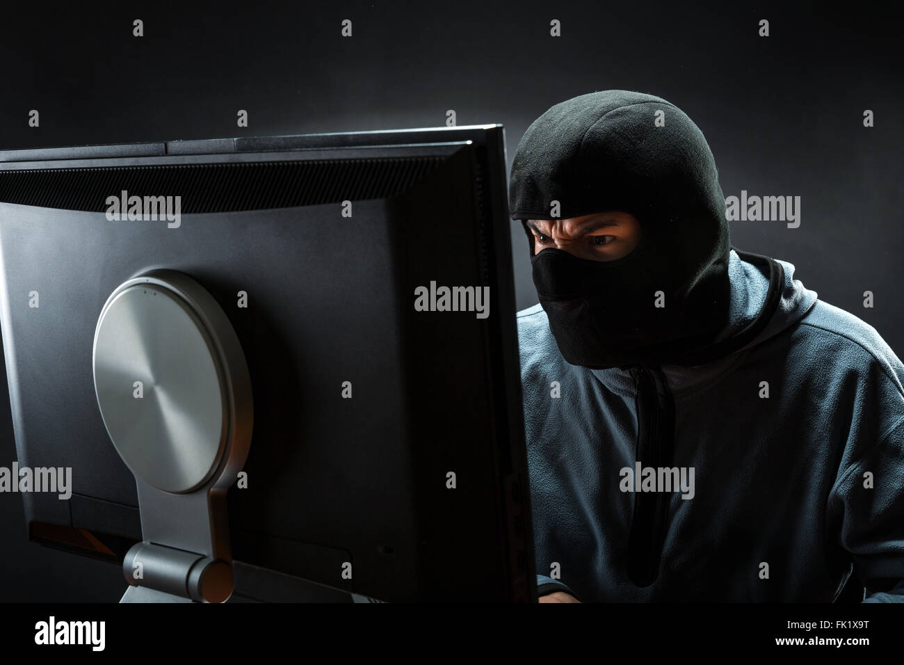 Hacker in the office Stock Photo - Alamy