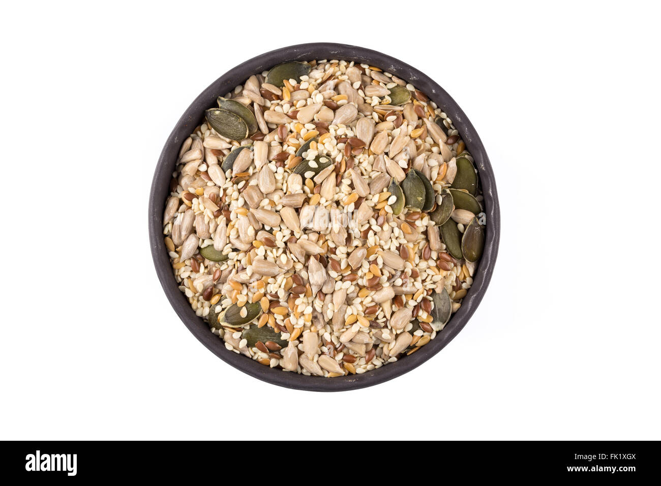 Healthy seeds mix in a stone bowl on white background Stock Photo - Alamy