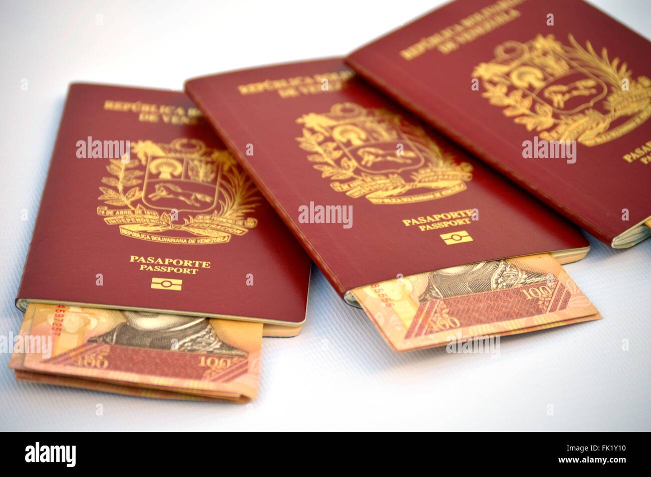 Venezuelan passports and bank notes Stock Photo - Alamy