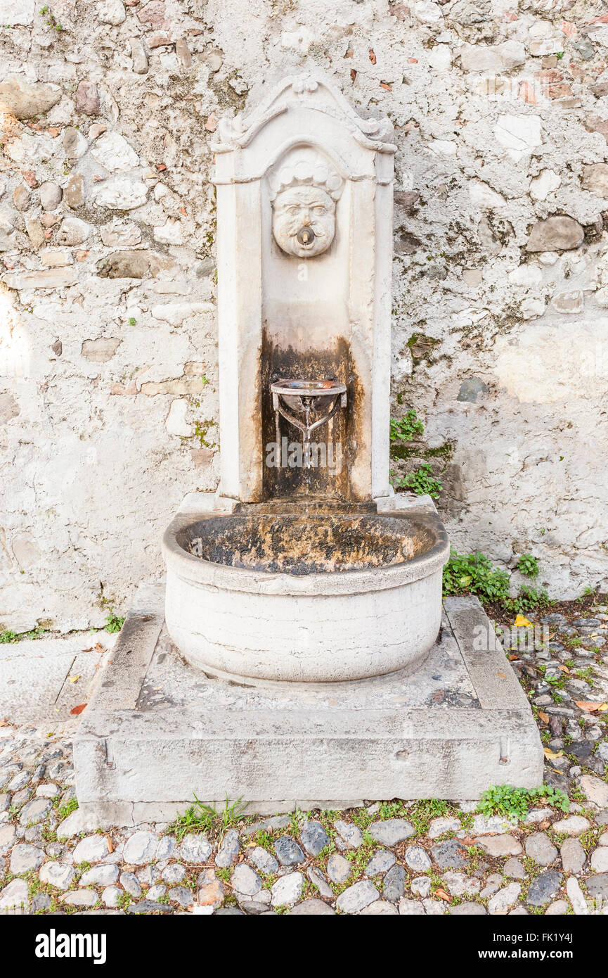 Old stone drinking water hi-res stock photography and images - Alamy