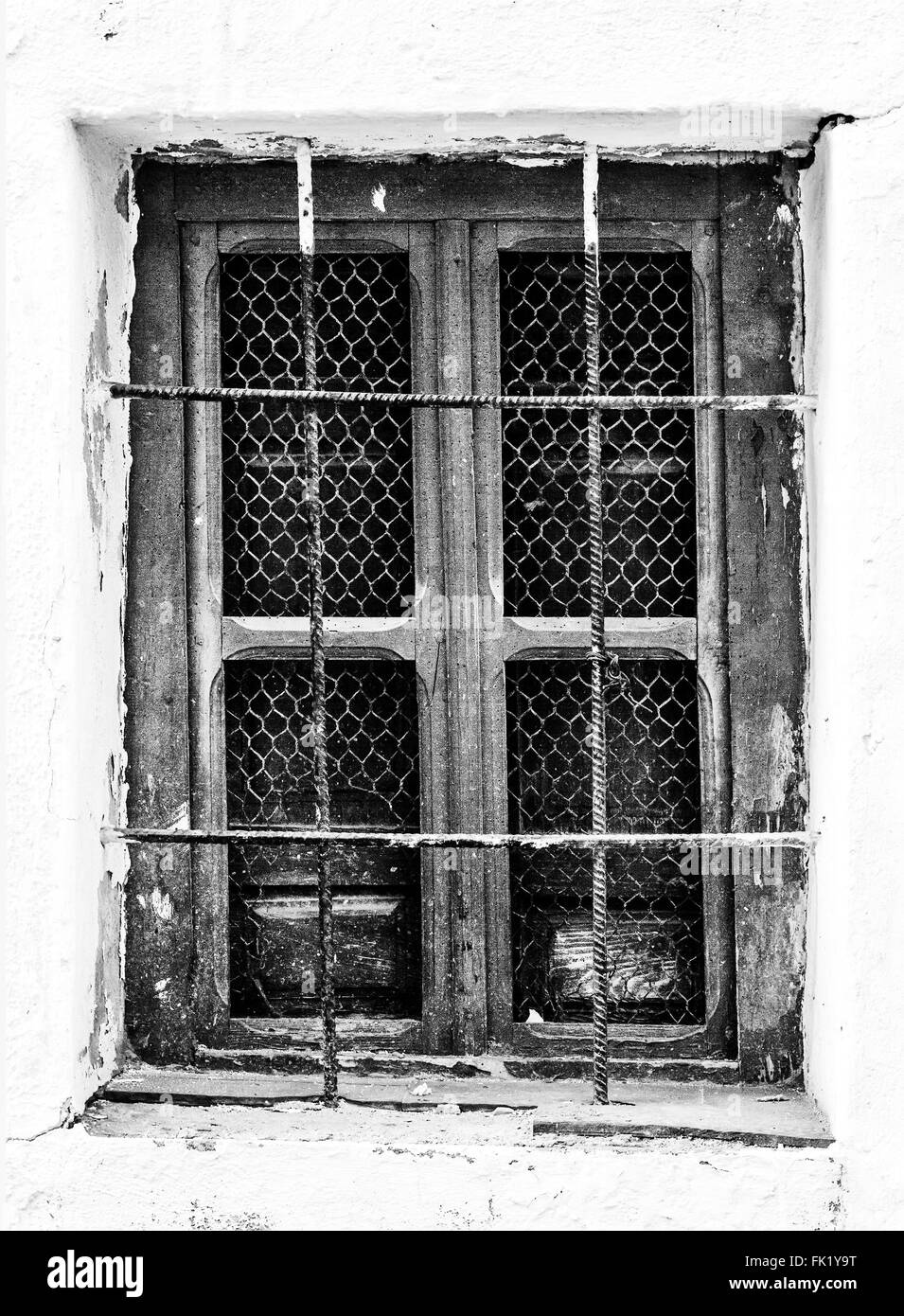 Retro photo of window with old lattice in vintage wall Stock Photo - Alamy