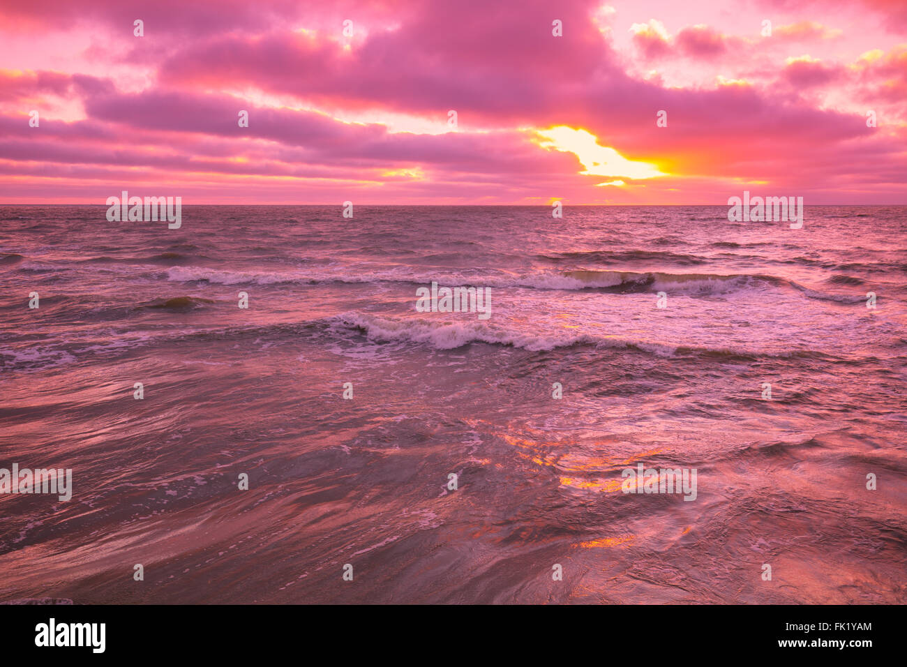 Pink sunset over sea Stock Photo - Alamy