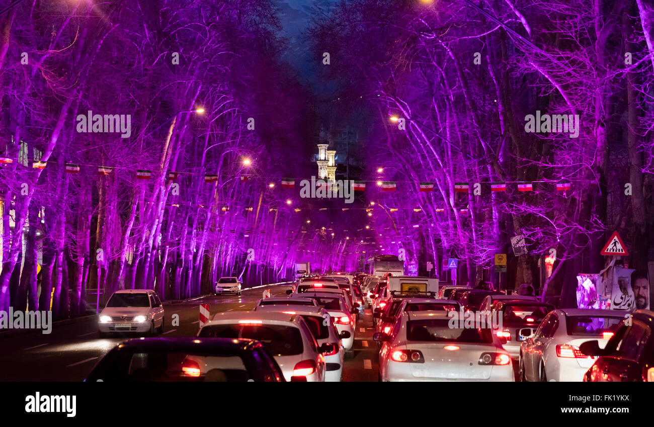 Evening view of illuminated plane trees arching over Valiasr St, Tehran ...