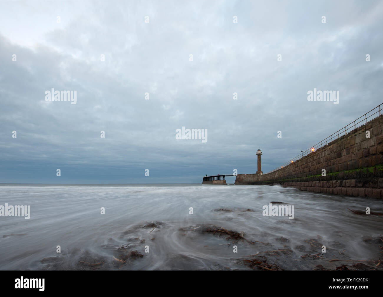 Whitby Lighthouse and beach Stock Photo - Alamy