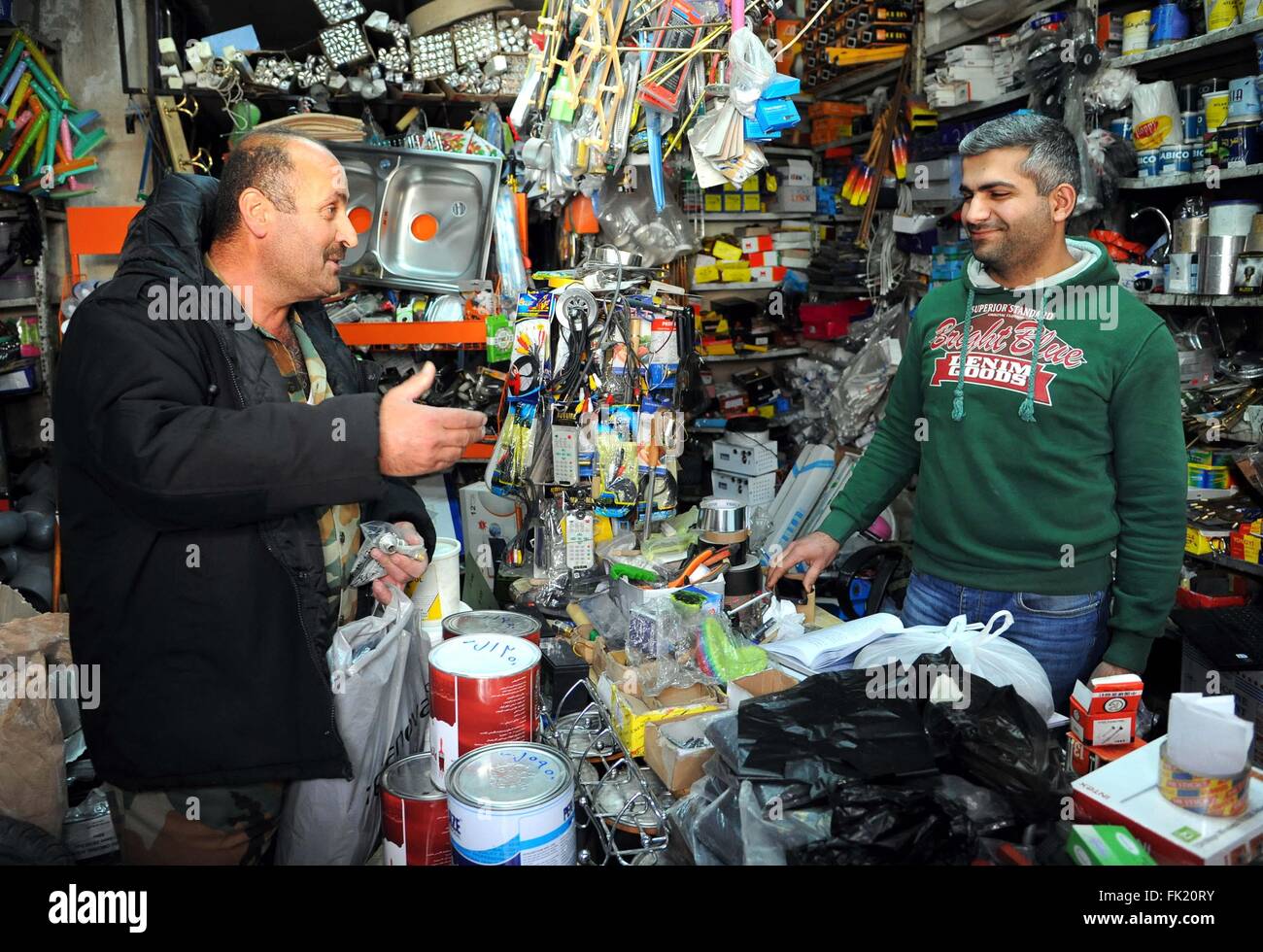 Damascus, Syria. 5th Mar, 2016. A Syrian man shops in the Mazeh-86 area ...
