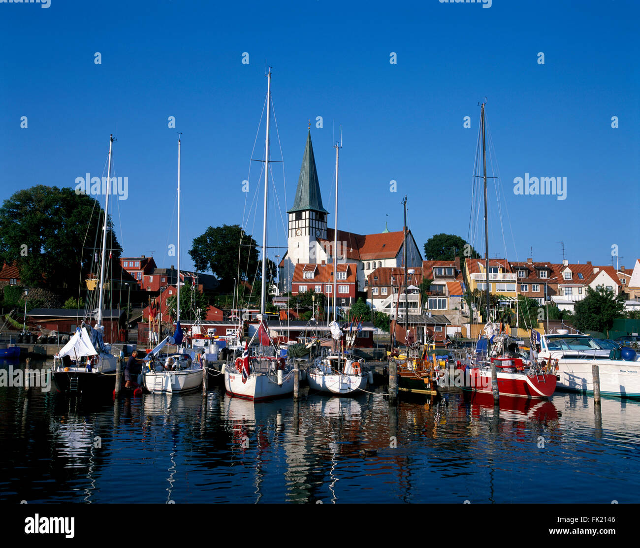 Old fishing harbour and St. Nikolas Church, Roenne, Bornholm island ...