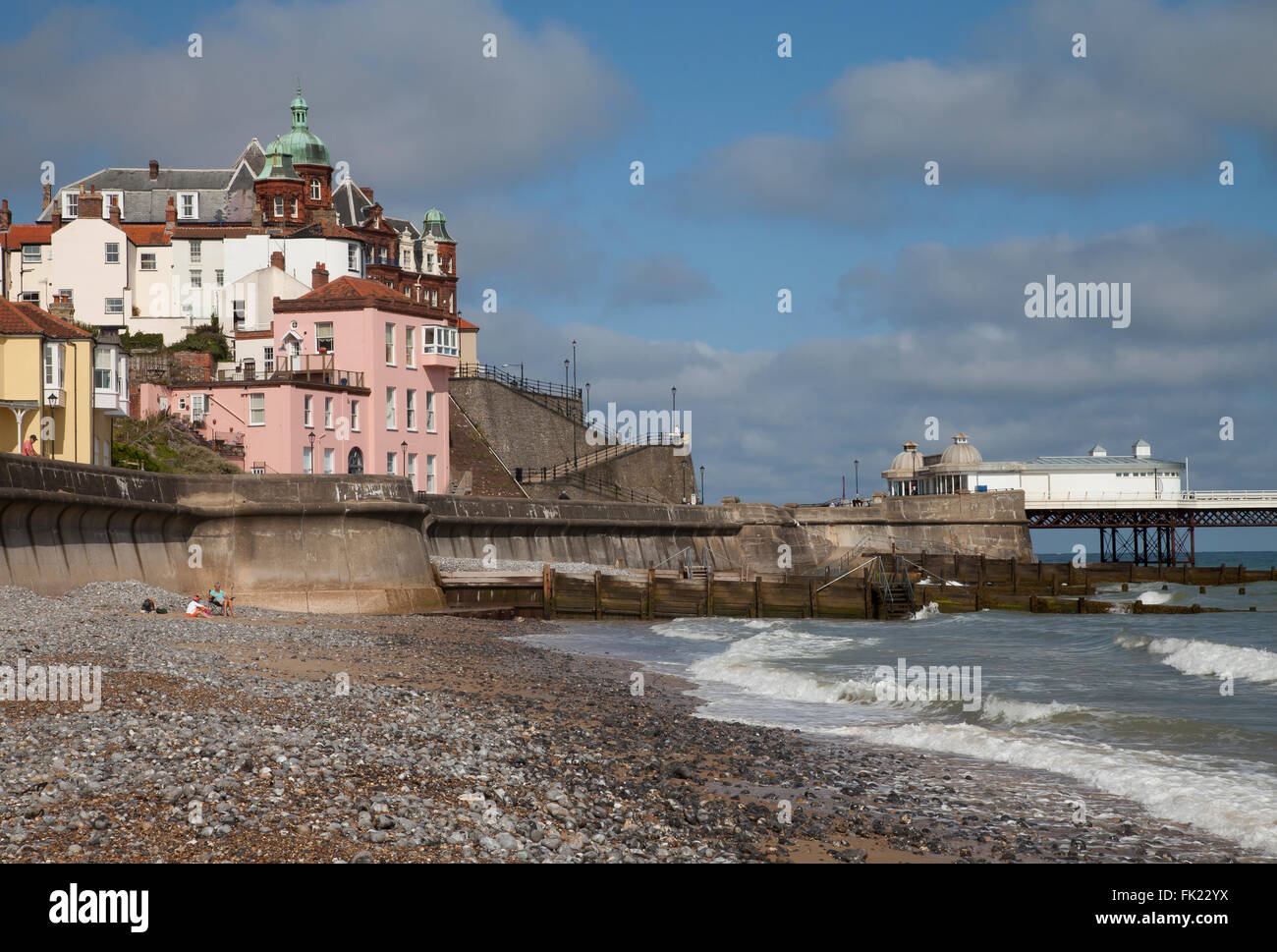 Cromer beach and pier and the colourful Victorian buildings against the ...