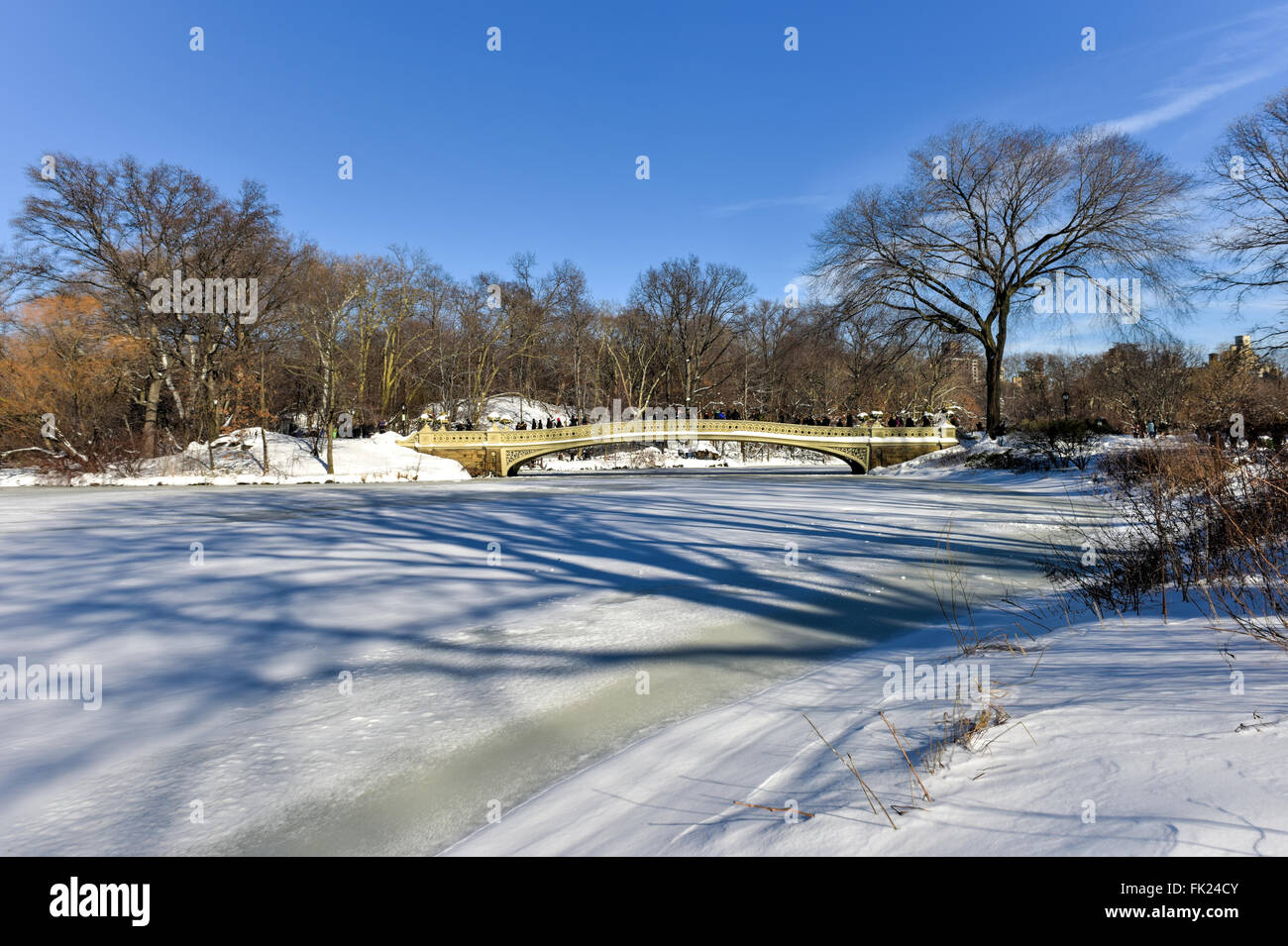 New York - January 24, 2016: The Bow Bridge is a cast iron bridge ...