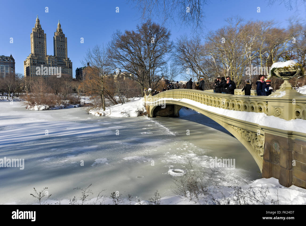 New York - January 24, 2016: The Bow Bridge is a cast iron bridge ...