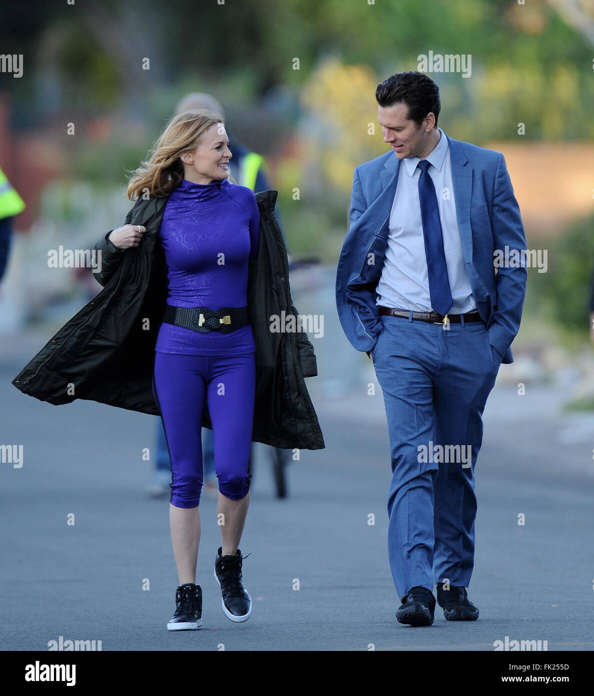 Heather Graham catches a ride on a garbage truck while being chased for ...