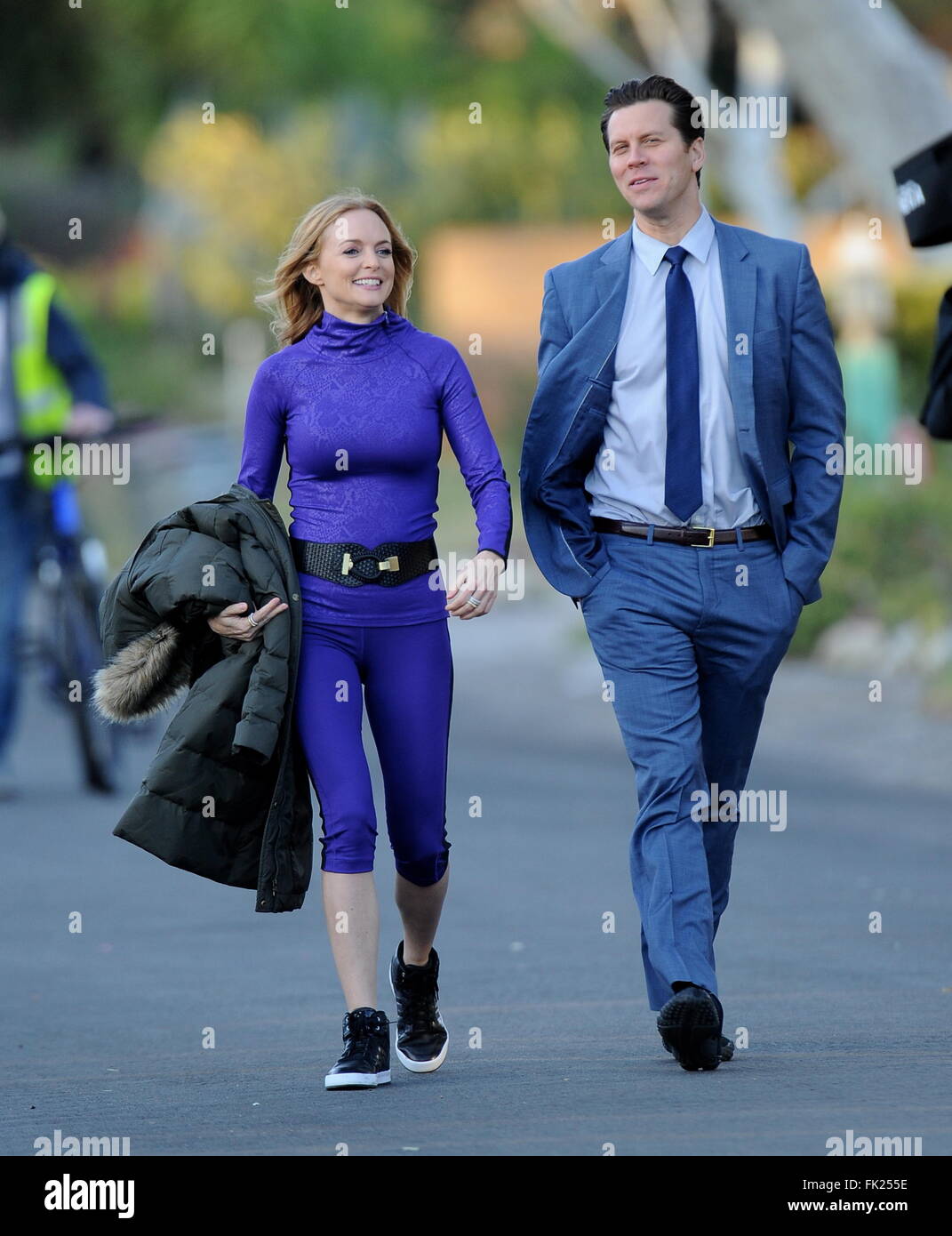 Heather Graham catches a ride on a garbage truck while being chased for ...