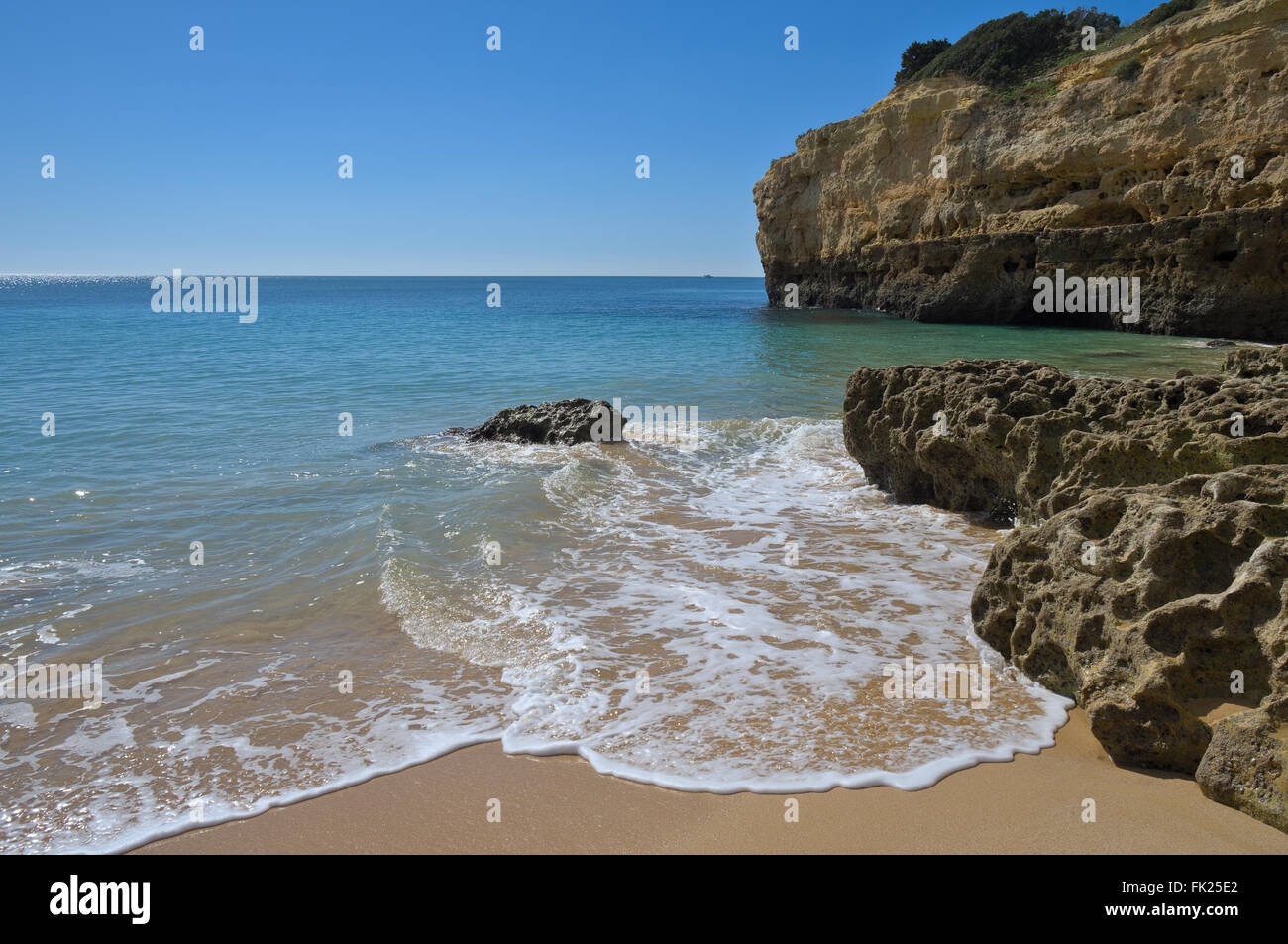 Beach scene in Albandeira Beach. Porches, Algarve, Portugal Stock Photo ...
