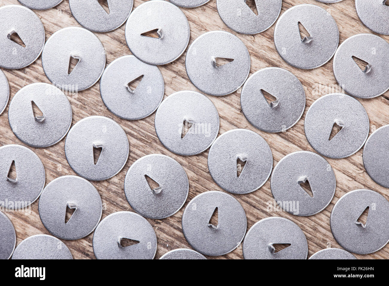 lot of pushpin top view on wooden surface macro background Stock Photo ...