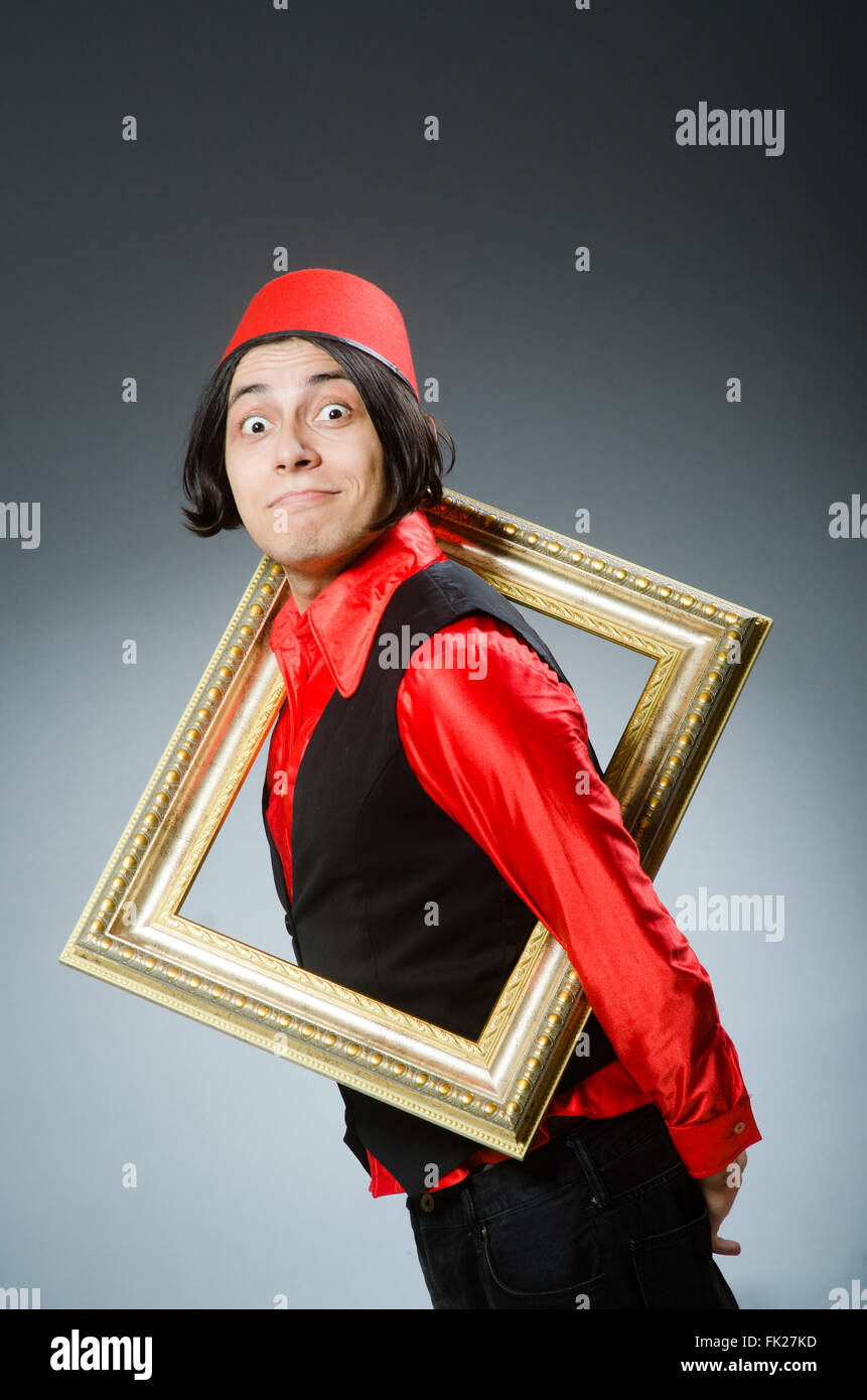 Man wearing red fez hat Stock Photo - Alamy