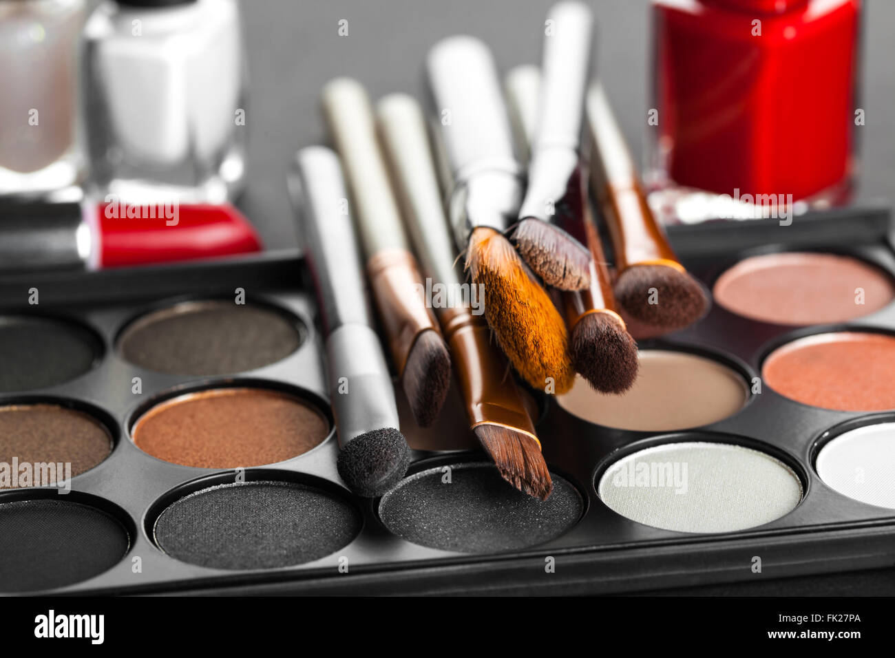 set of decorative cosmetics on a dark background Stock Photo - Alamy