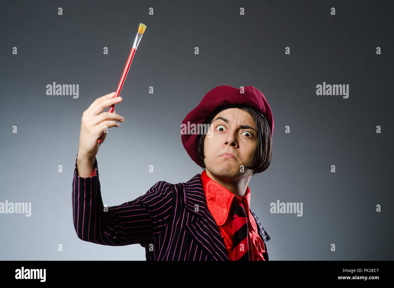 Funny artist with his artwork Stock Photo - Alamy