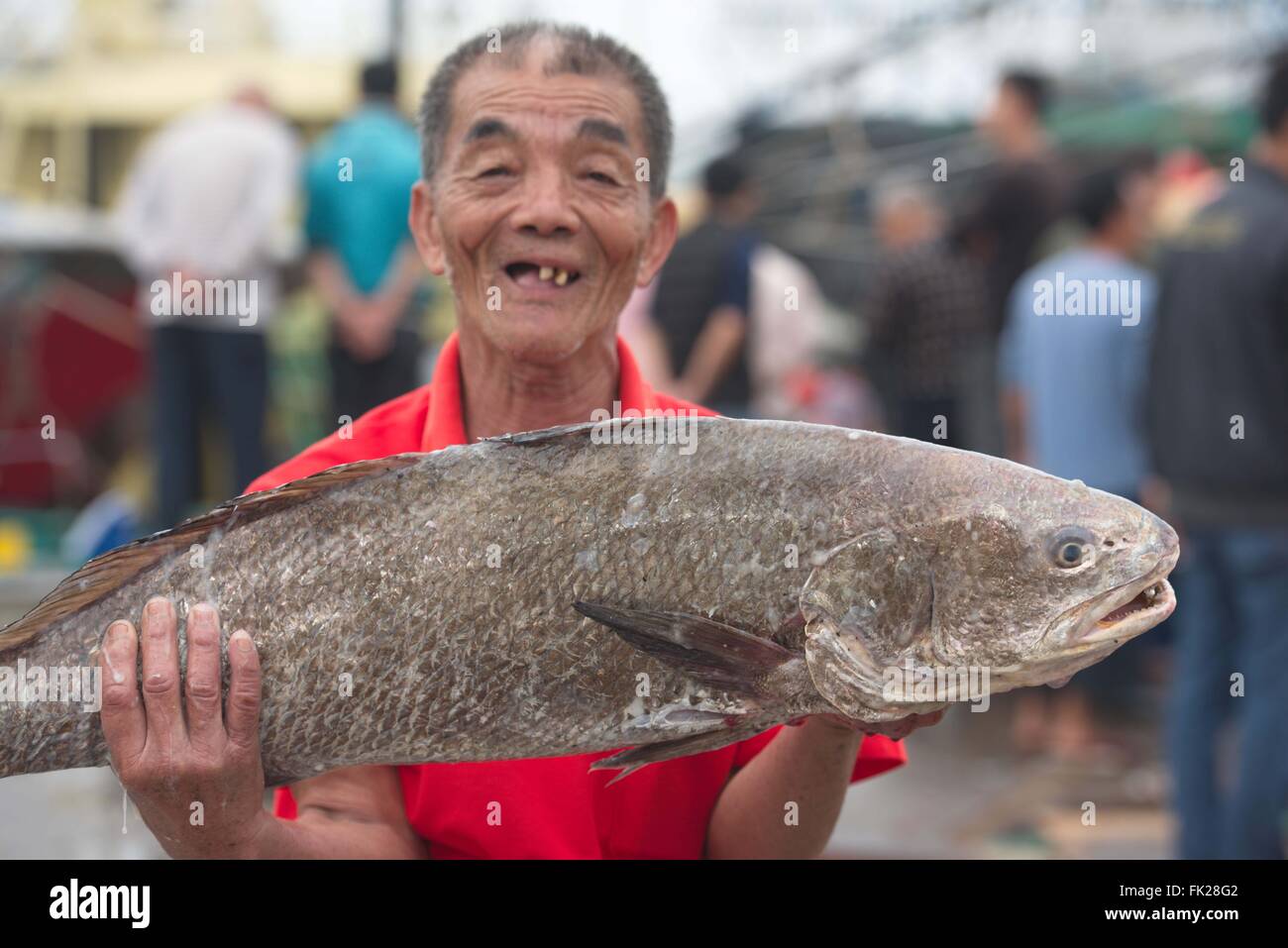 Qionghai, China's Hainan Province. 6th Mar, 2016. A fisherman shows a ...