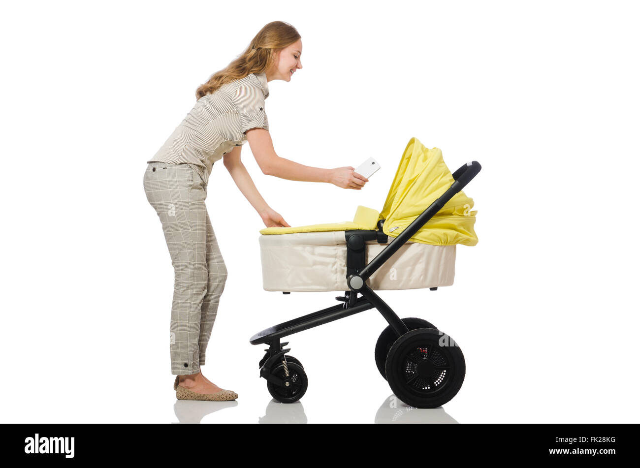 Woman with baby and pram isolated on white Stock Photo - Alamy