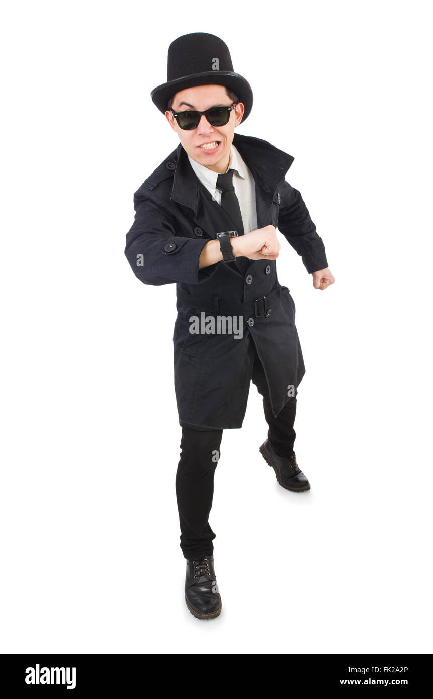 Young detective in black coat isolated on white Stock Photo - Alamy