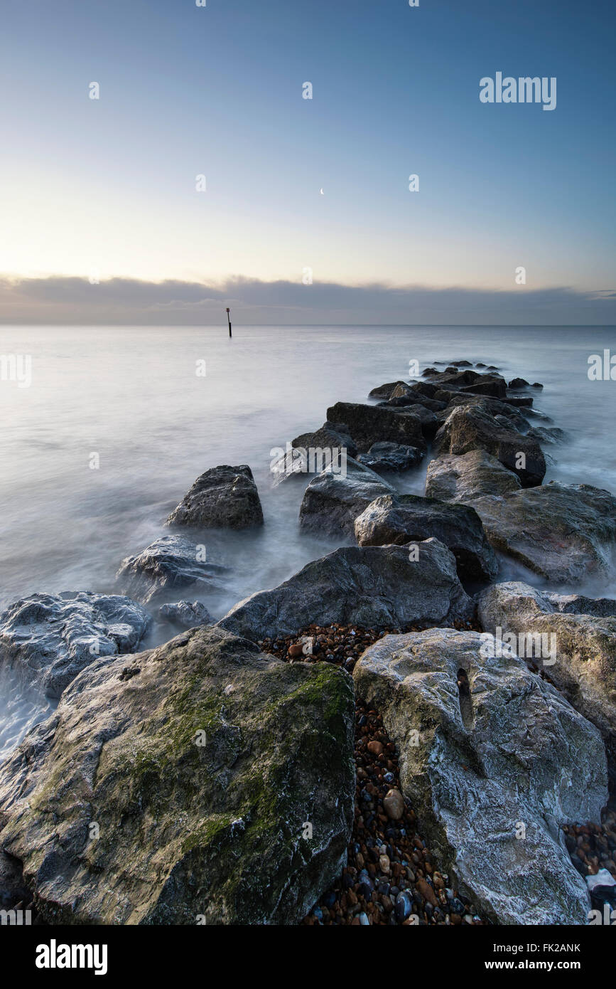 Sunrise over ocean and rocks hi-res stock photography and images - Alamy