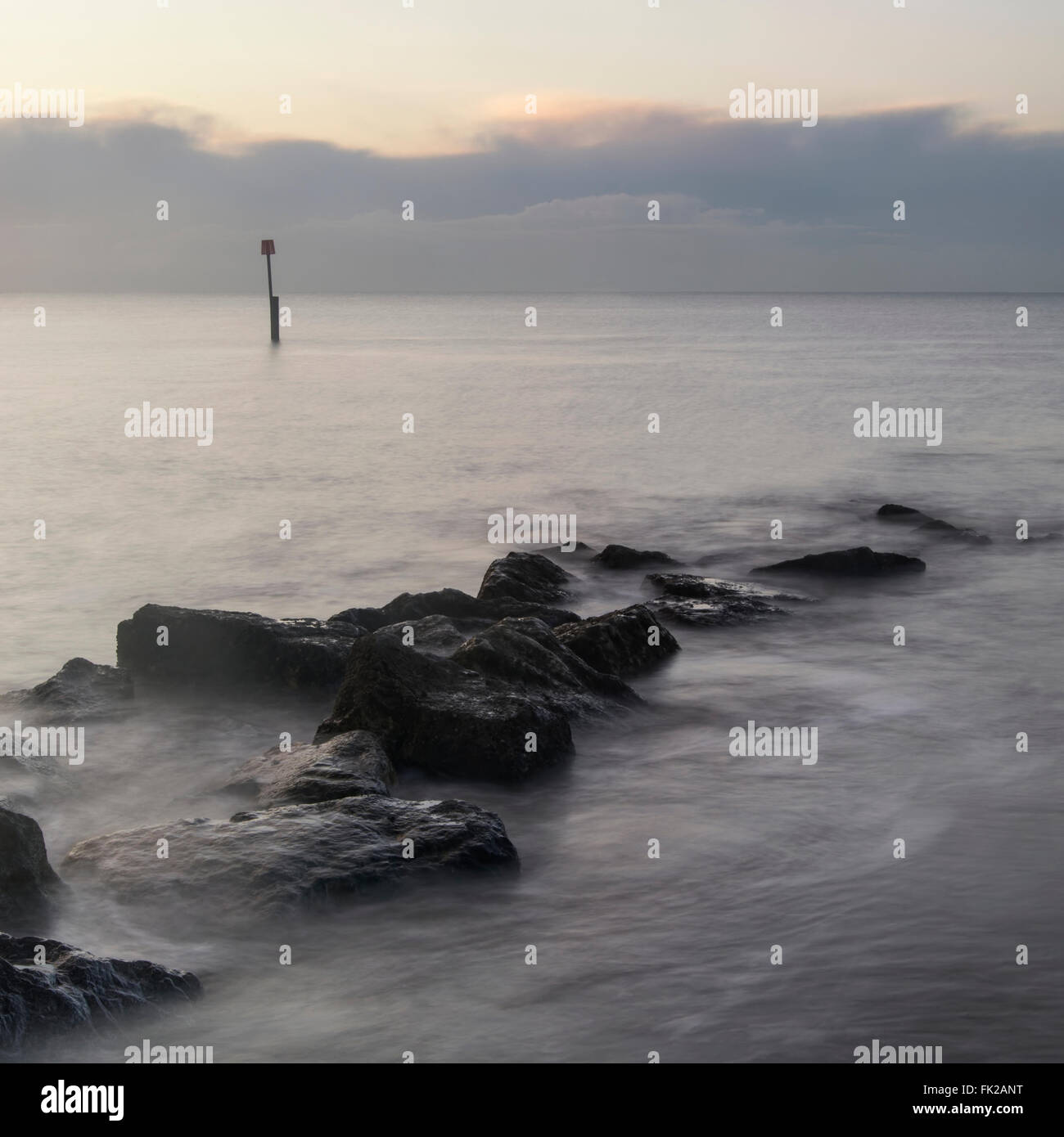 Sunrise over ocean and rocks hi-res stock photography and images - Alamy