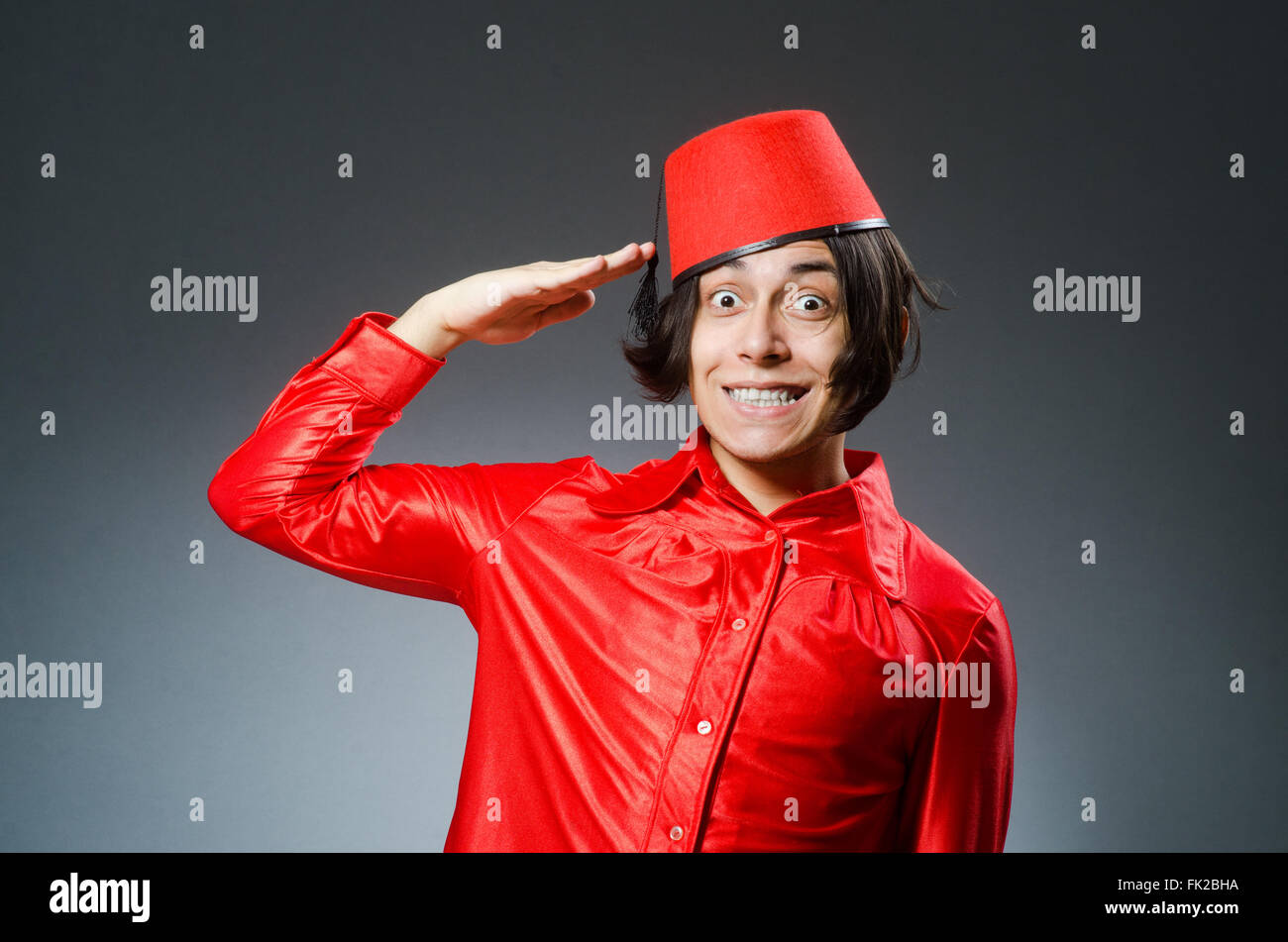 Man wearing red fez hat Stock Photo - Alamy