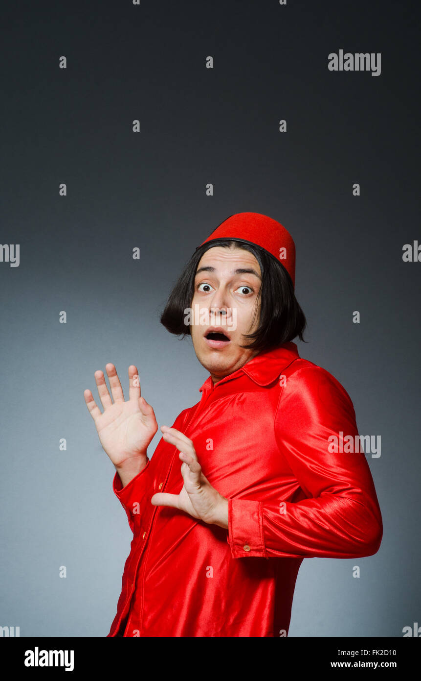 Man wearing red fez hat Stock Photo - Alamy