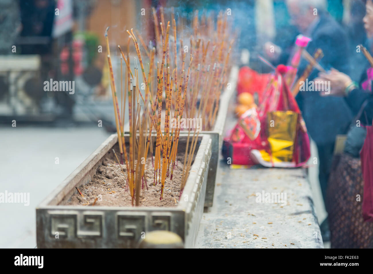 Burning joss stick put in chinese pot of temple Stock Photo - Alamy