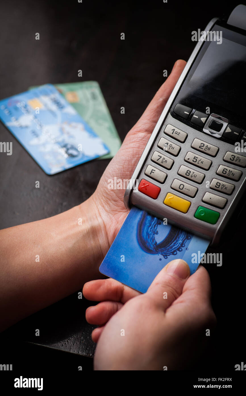 Color image of a POS and credit cards Stock Photo - Alamy