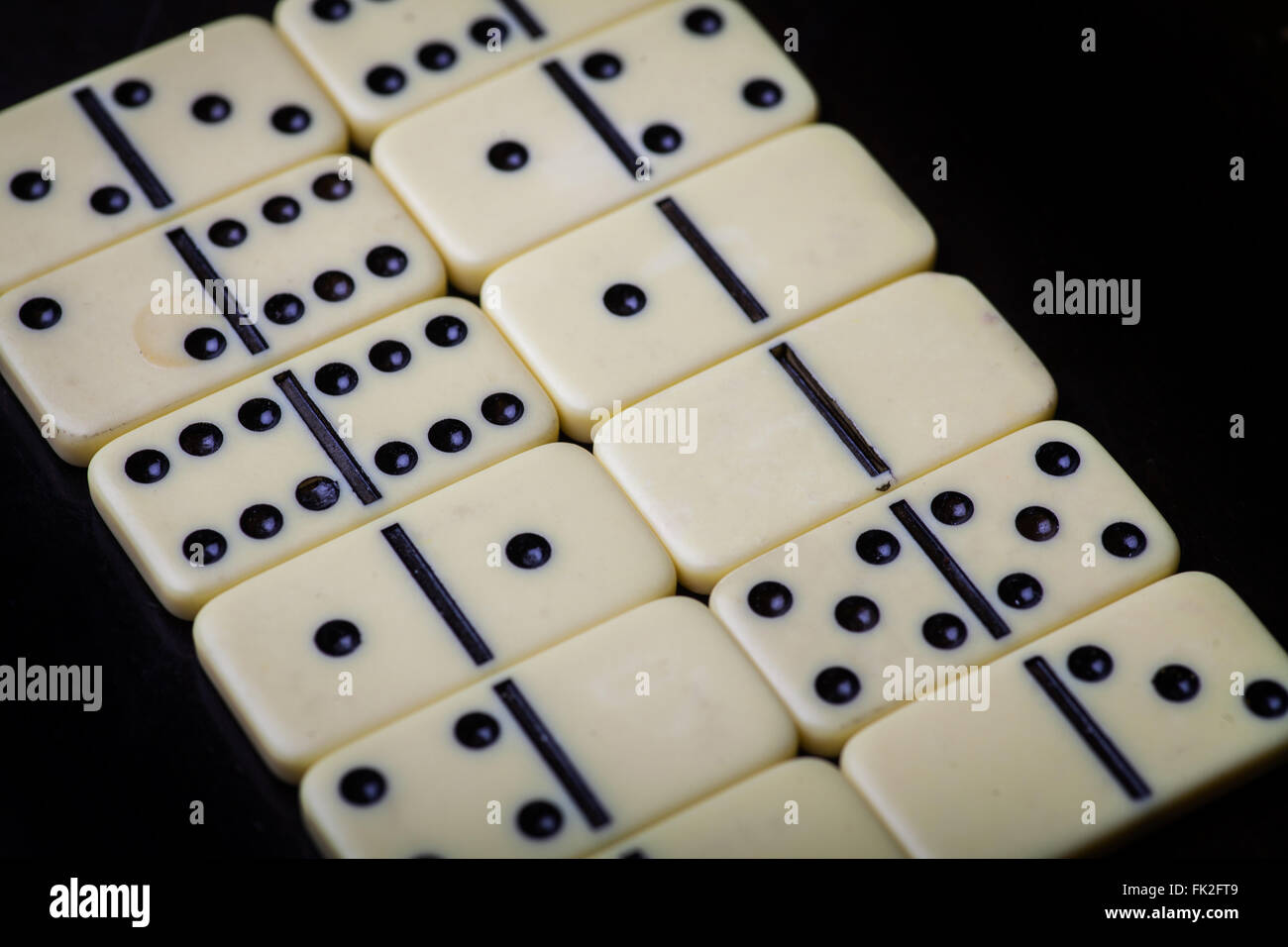 Color image of some dominos pieces on a table Stock Photo - Alamy