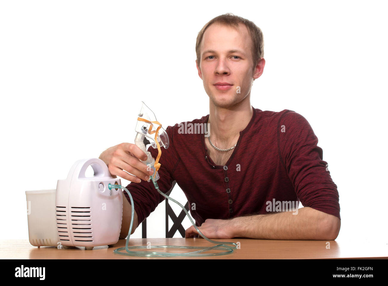 Young man using nebulizer mask for respiratory inhaler Asthma Treatment ...