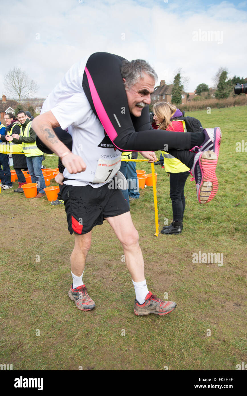 Wife carrying contest hi-res stock photography and images - Alamy