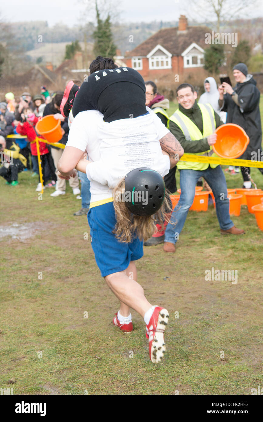 Wife carrying contest hi-res stock photography and images - Alamy