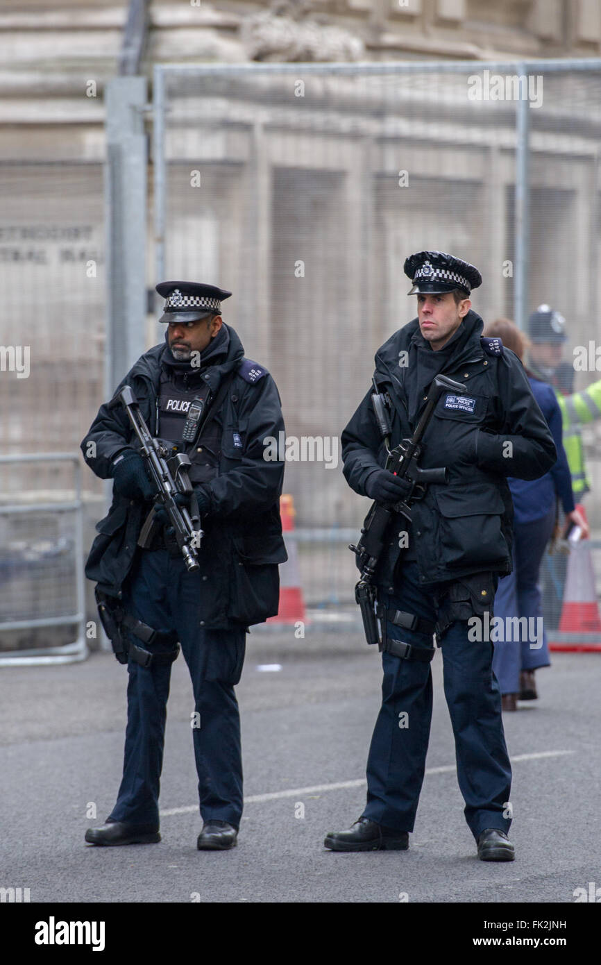 Armed police guarding he main gate of the Syria Donor Conference ...