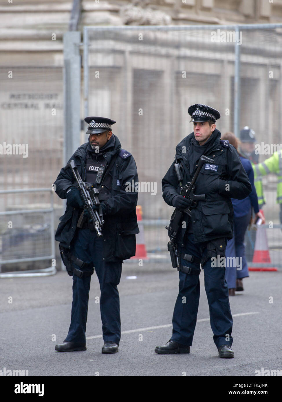 Armed police guarding he main gate of the Syria Donor Conference ...
